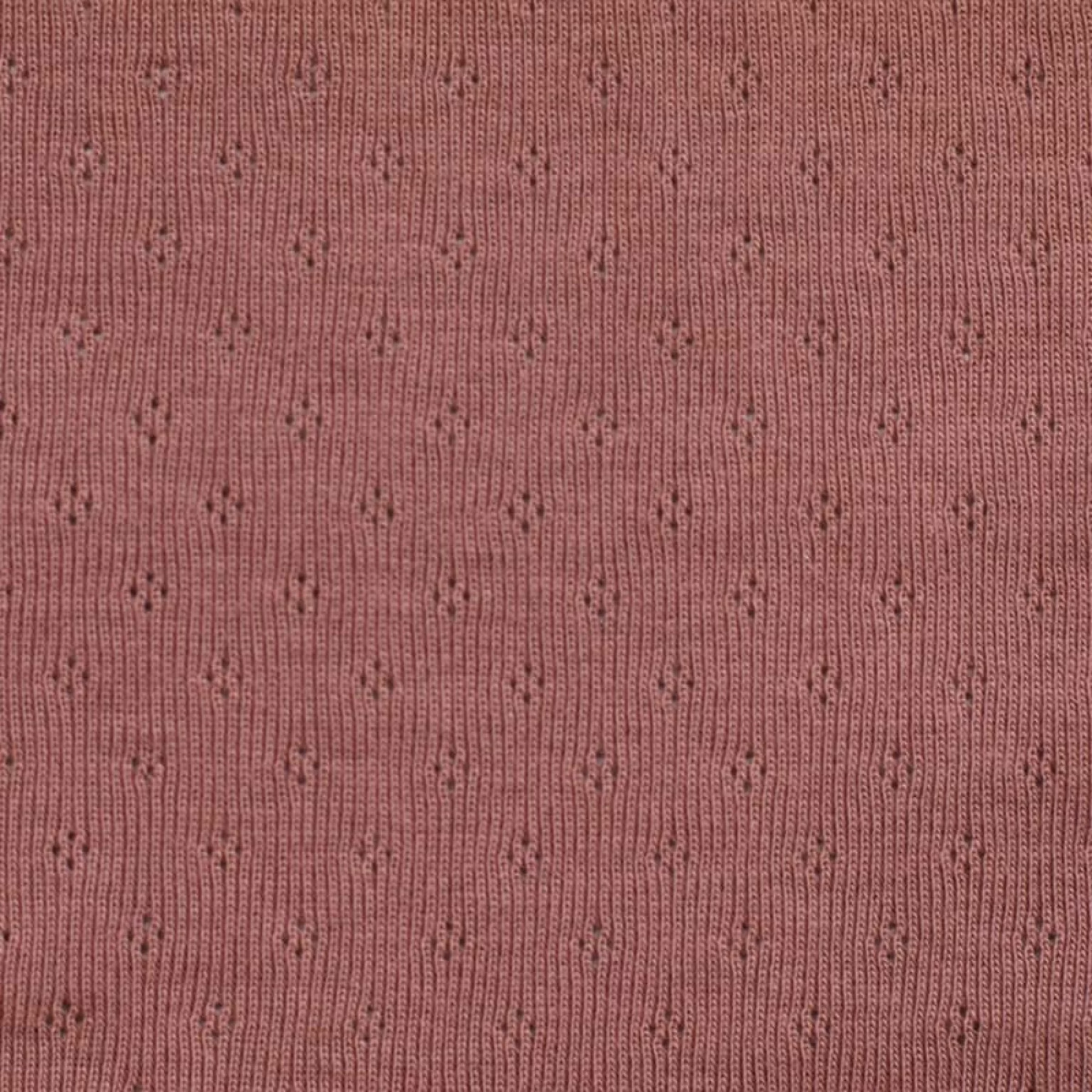 Mini Pointelle also known as Ajour Jersey fabric.