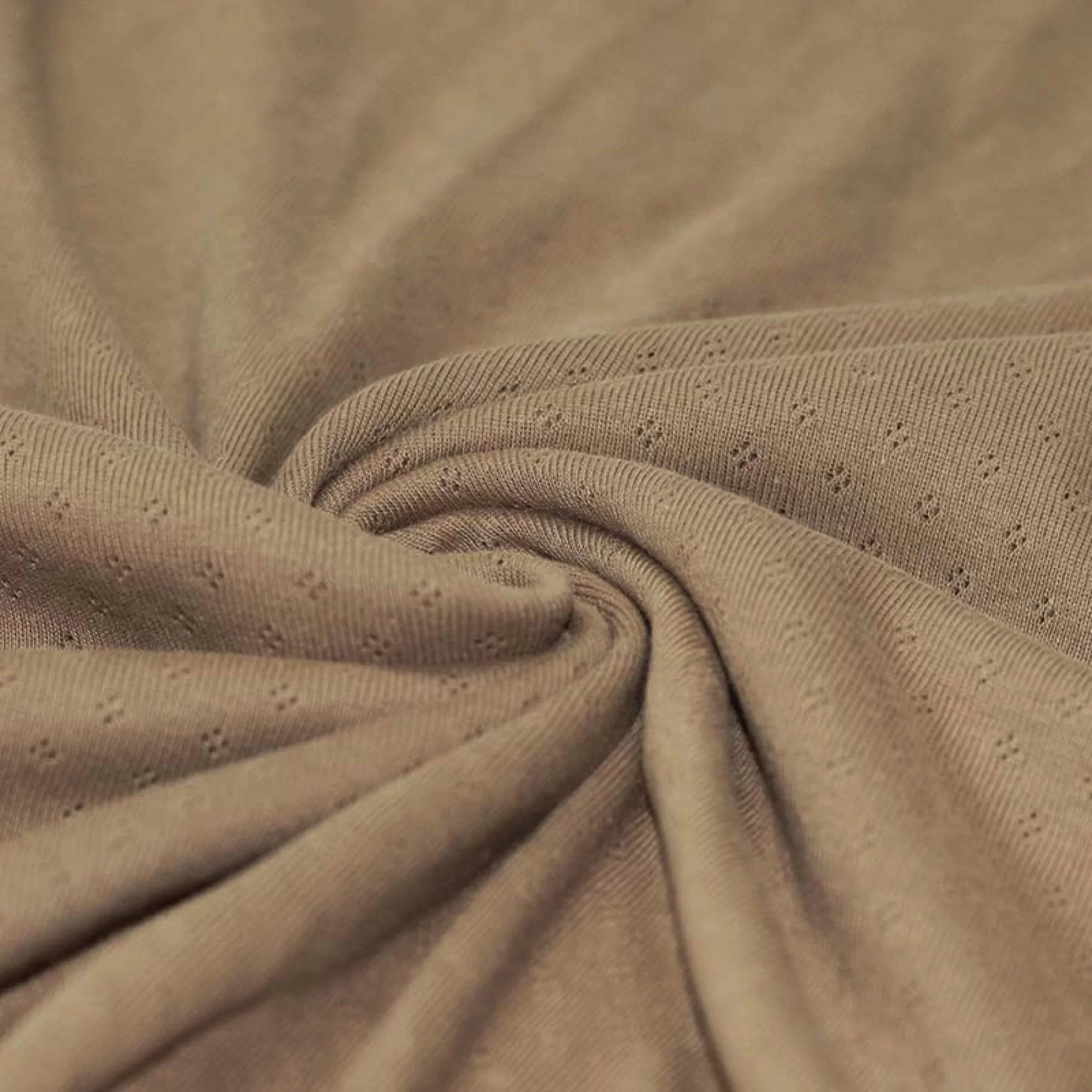 Buy pointelle cotton jersey fabric camel? From € 4.75 p/m
